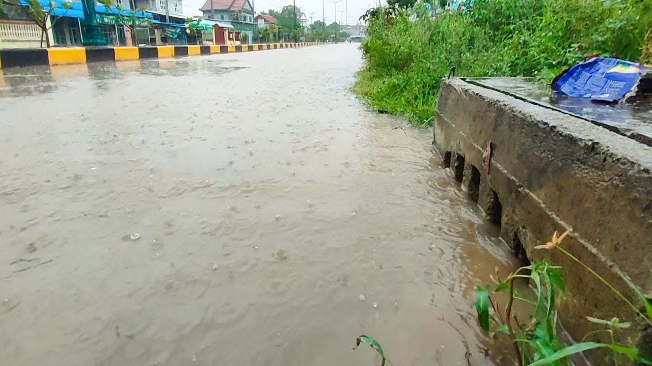 Draining Street Flood After Heavy Rain In City For Traffic Vehicles ...