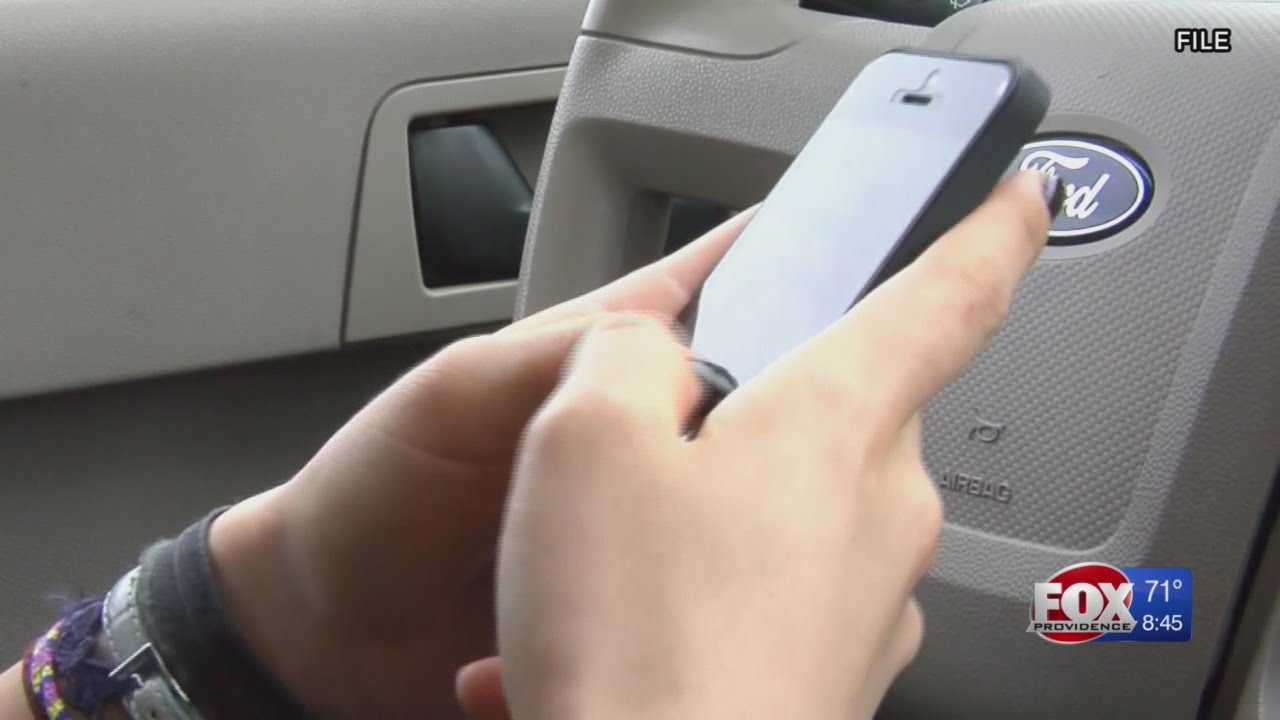 Proposed ban of handheld phone use while driving - YouTube