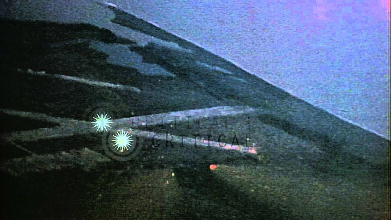 United States Army Air Force tracers strafe gun emplacement and ...