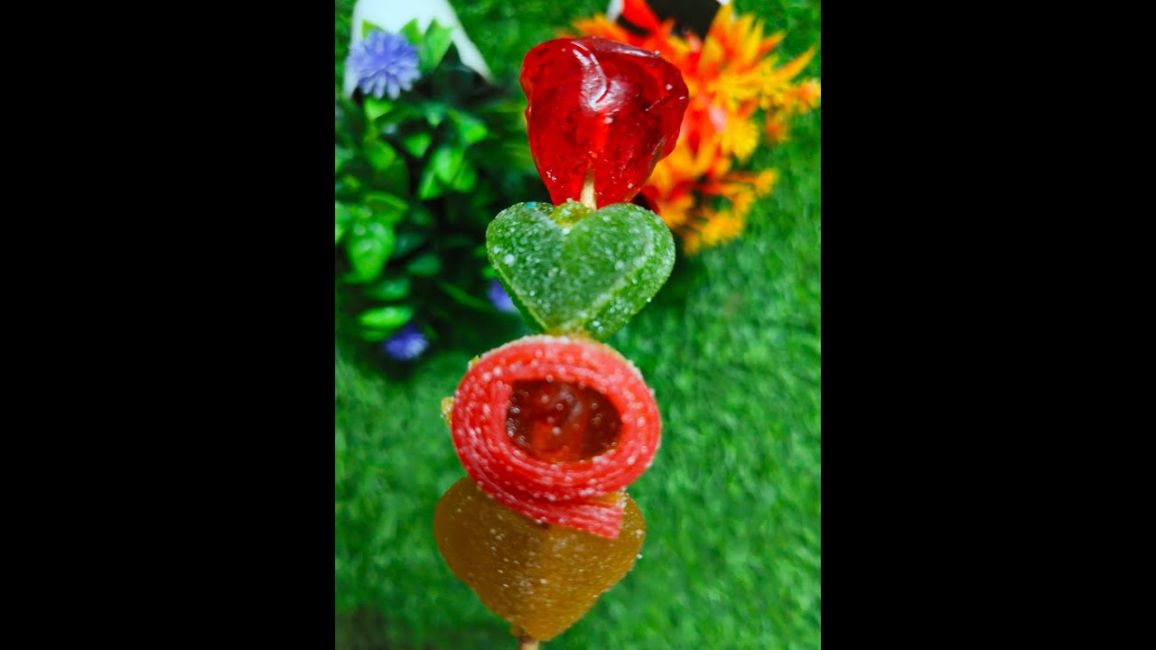 red chilli candy or lots of fruit lollipop surprise candy or live ...