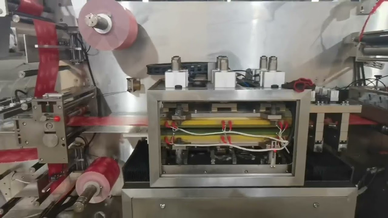 automatic circle cotton pads die-cutting and packaging machine - YouTube