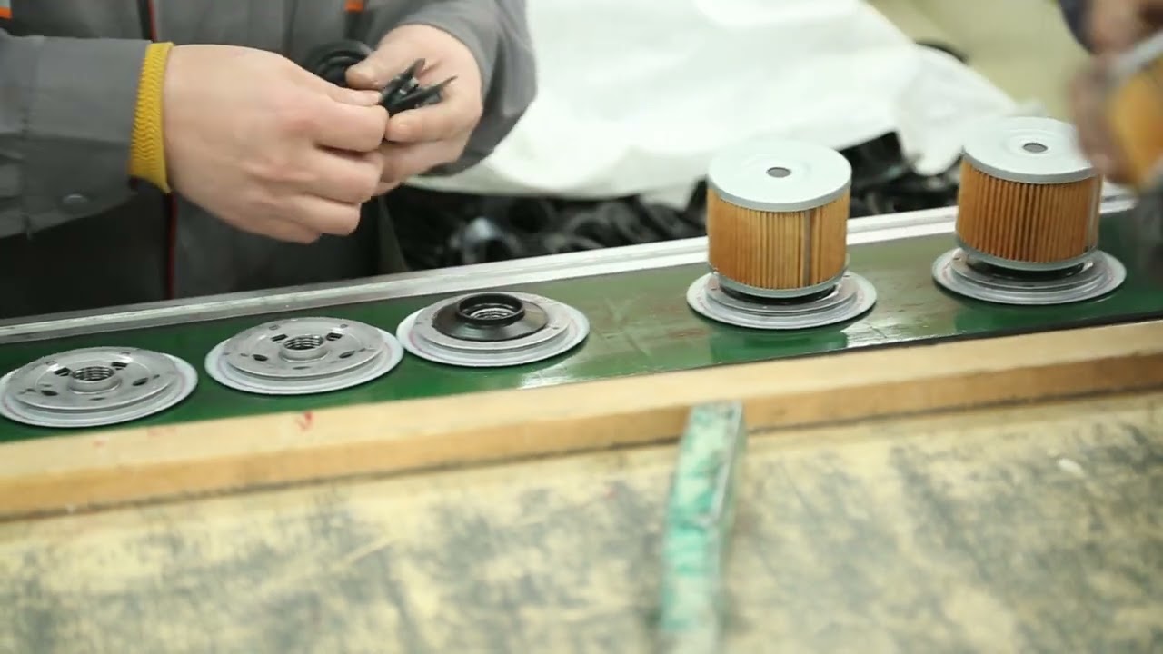 Assemble oil filters prduction line - YouTube