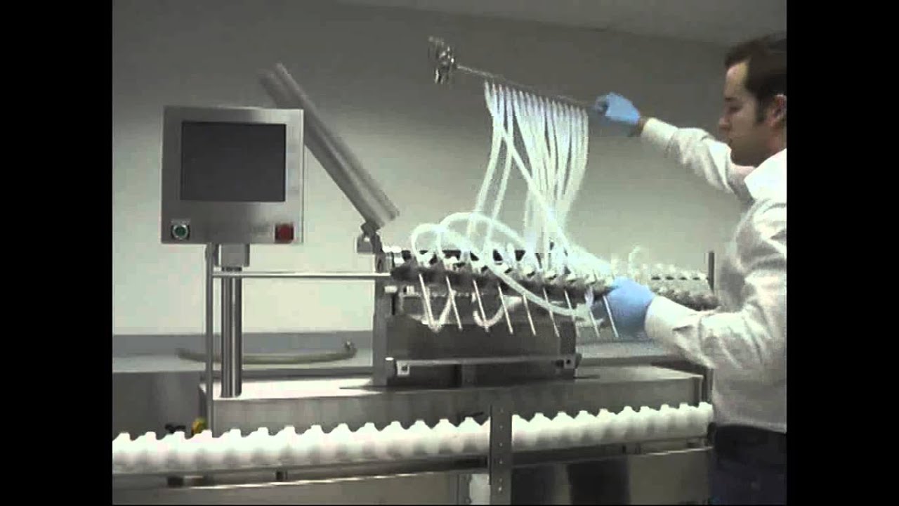 Walking Beam Liquid Filling Machine - YouTube