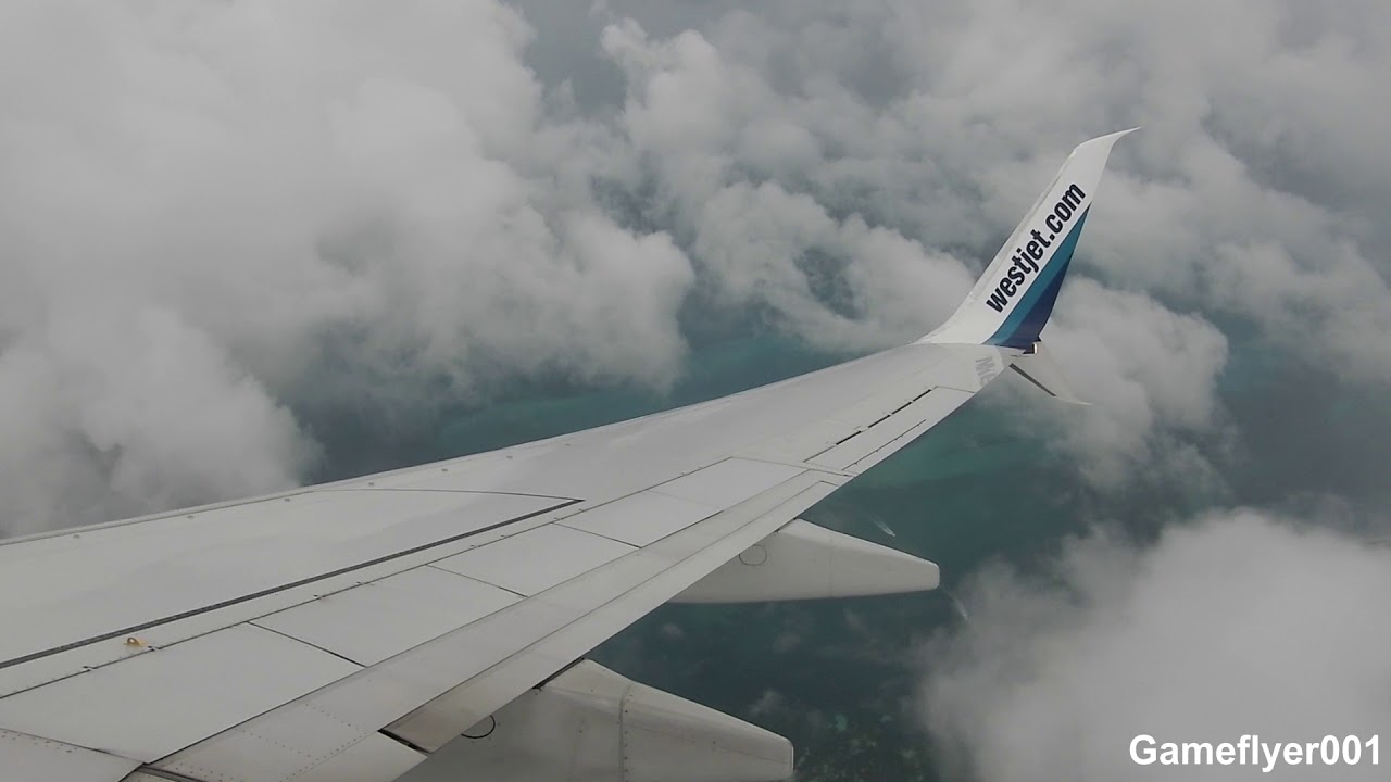 WestJet Boeing 737-800 rainy afternoon departure from CUN (January 28 ...