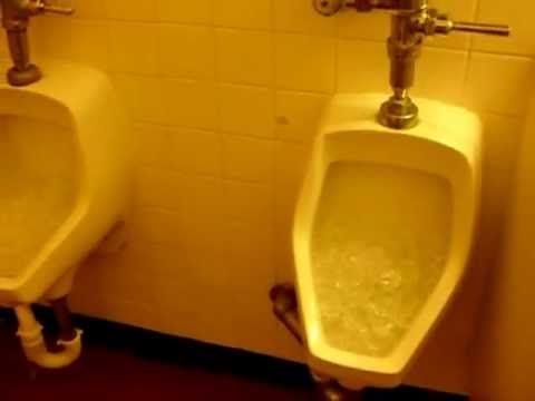 Urinals filled with ice cubes - YouTube