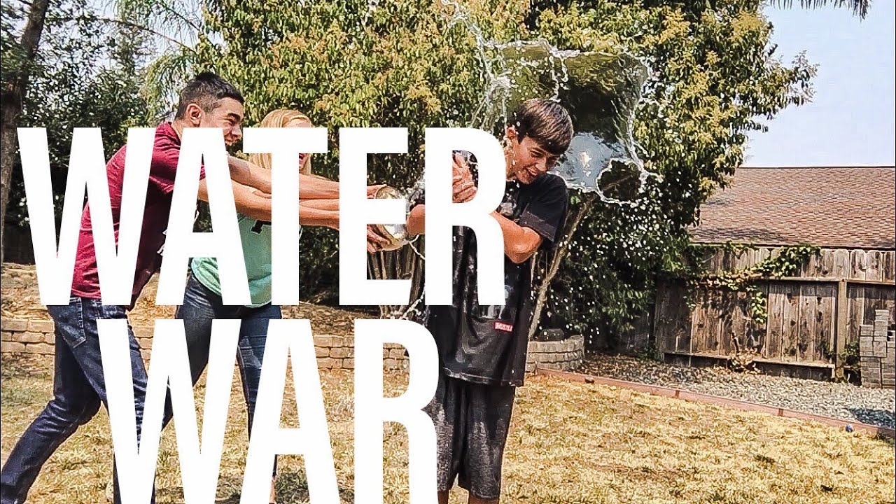 THROWN IN THE POOL | WATER WAR CHALLENGE - YouTube