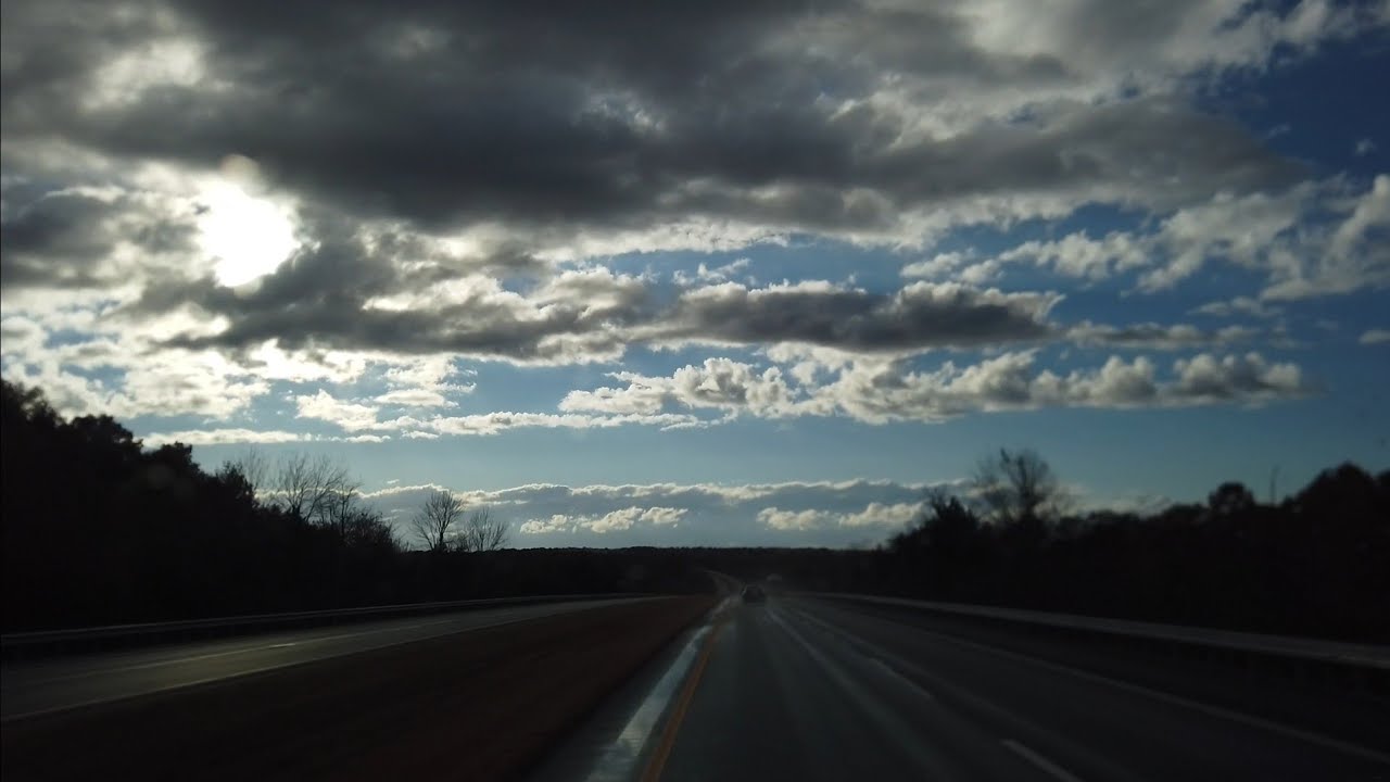 Weird drive through a storm, then breaking into sunshine... - YouTube