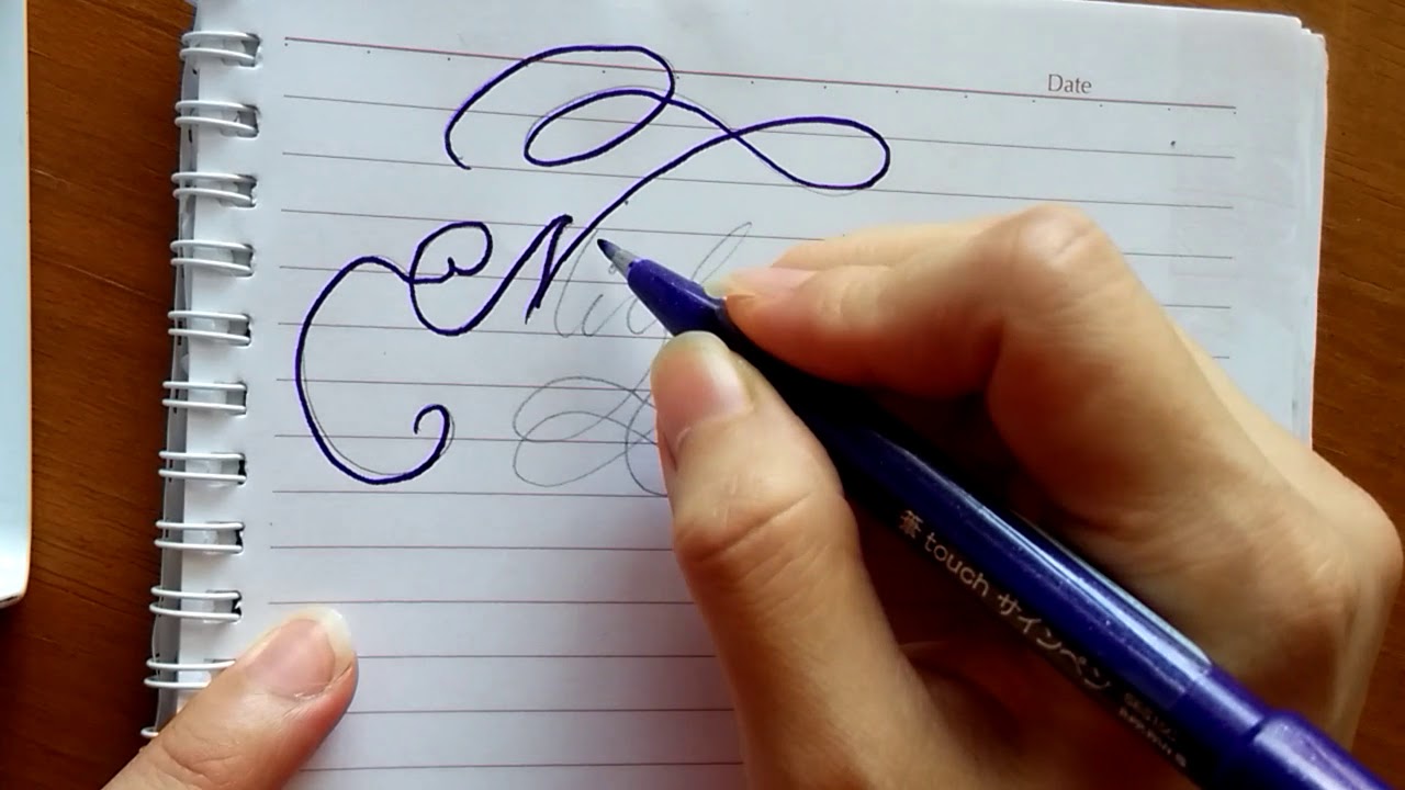 Flourish name of "Michelle" calligraphy, lettering - YouTube