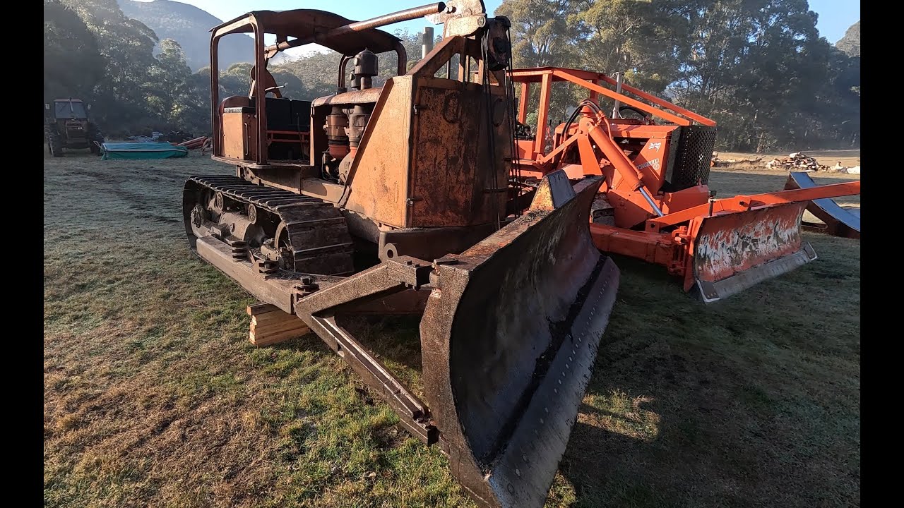 Old dozers in action on the boundary line. - YouTube