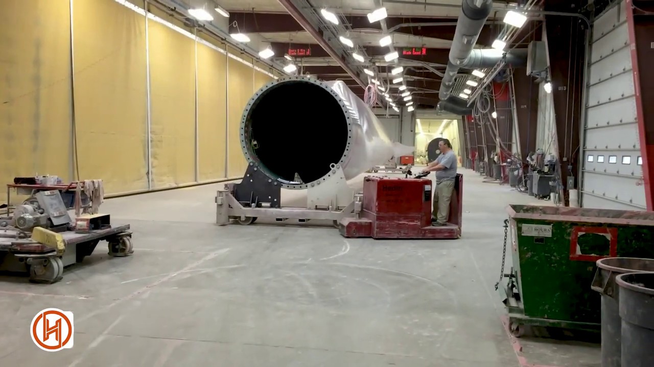 Wind Turbine Manufacturing with Ride-on Tugger | Hedin USA - YouTube