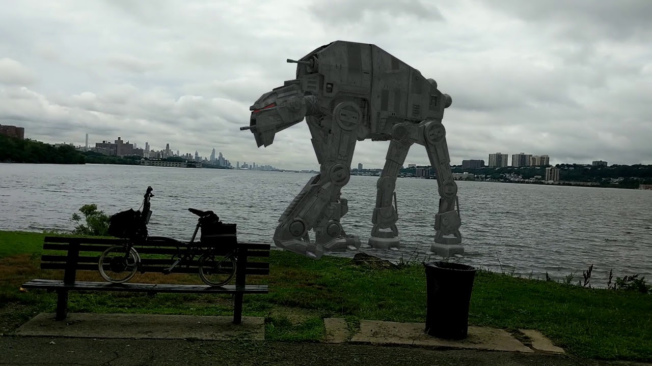 ATAT Star Wars frolicking in the water riding Brompton Folding Bicycle ...