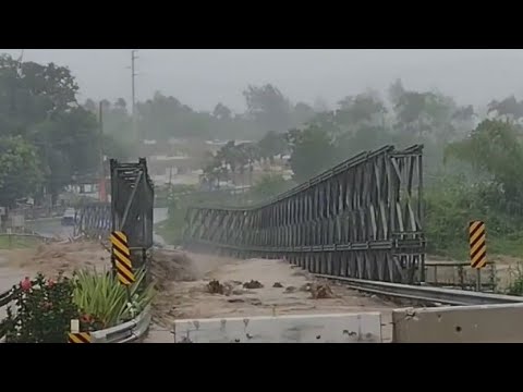 Bridge washes away during Hurricane Fiona - YouTube