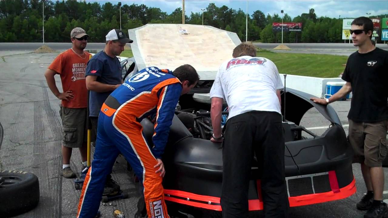 Kyle Busch works on his TD Bank 250 Late Model at Oxford Plains ...