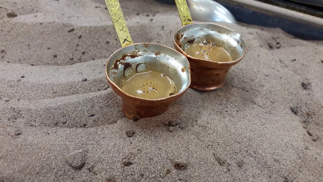 Greek coffee heated in sand at Mokka - YouTube