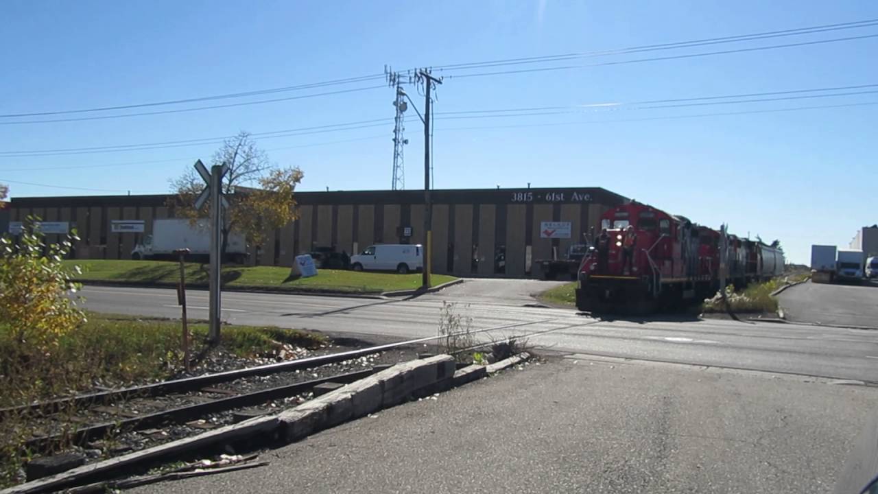 Short CN train Crossing 61st Ave Calgary AB - YouTube