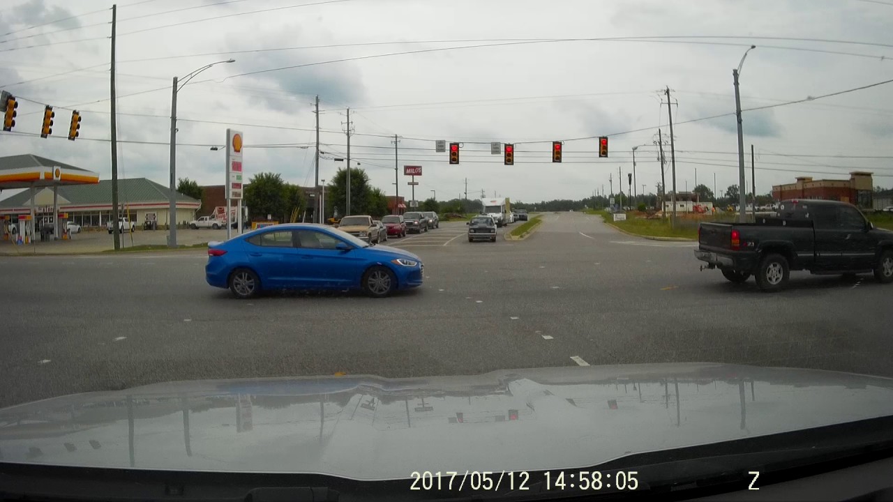 Car Blocking Intersection - YouTube