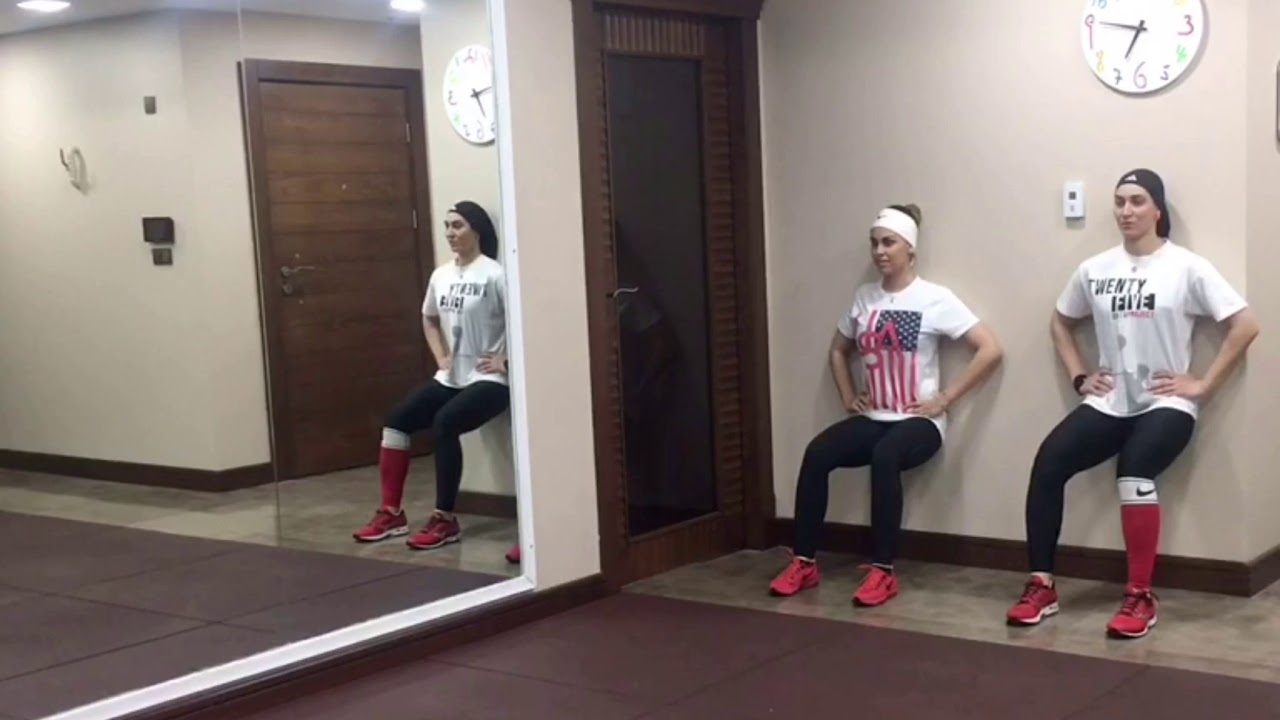 wall sit squat - YouTube