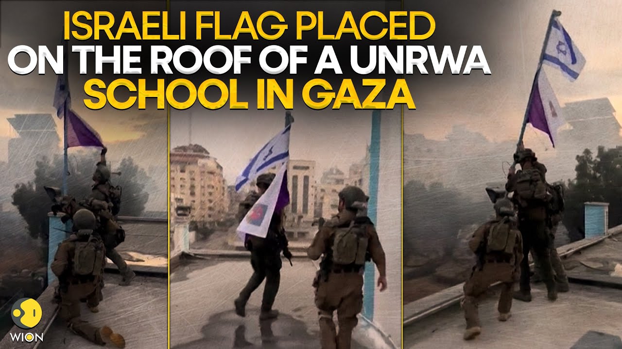 Israel-Palestine War: Soldiers place an Israeli flag on the roof of a ...