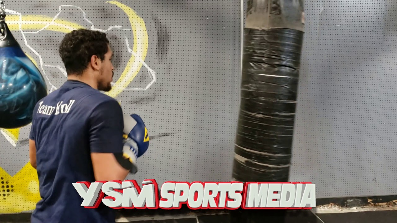 Paul Kroll works on the heavy bag for January 18th bout - YouTube