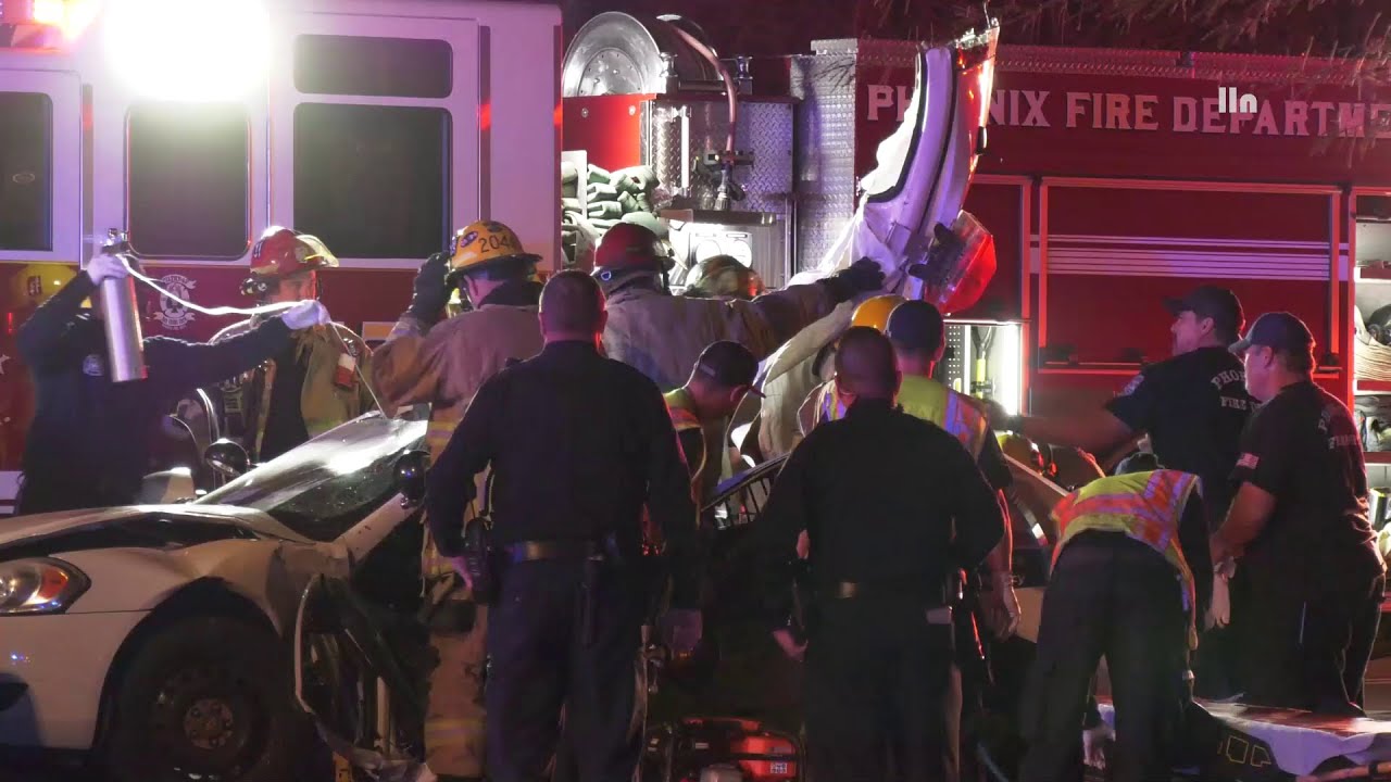 Phoenix Police Officer Extricated From Patrol Car After Horrific Hit ...