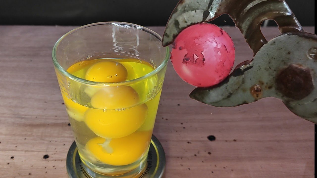 Experiment Glowing 1000 degree METAL BALL vs EGGS - YouTube