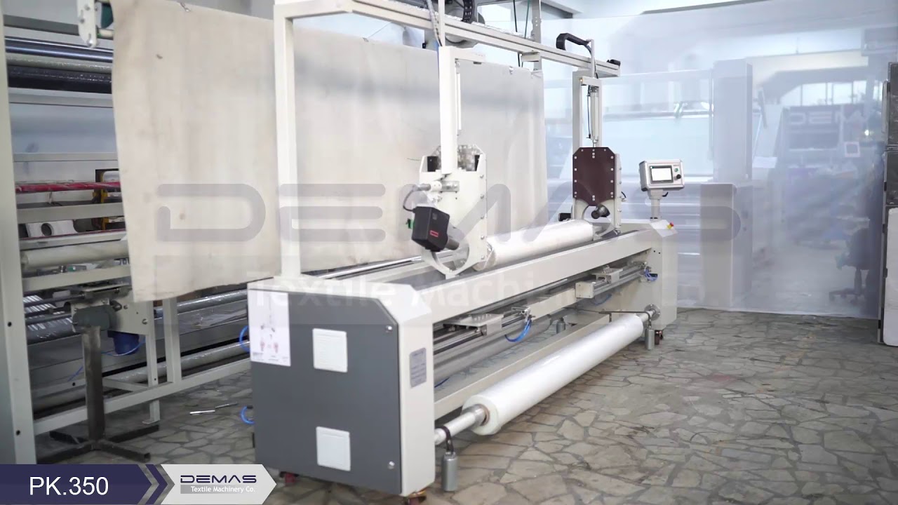 Demas Semi Automatic Fabric Roll Packaging Machine - YouTube