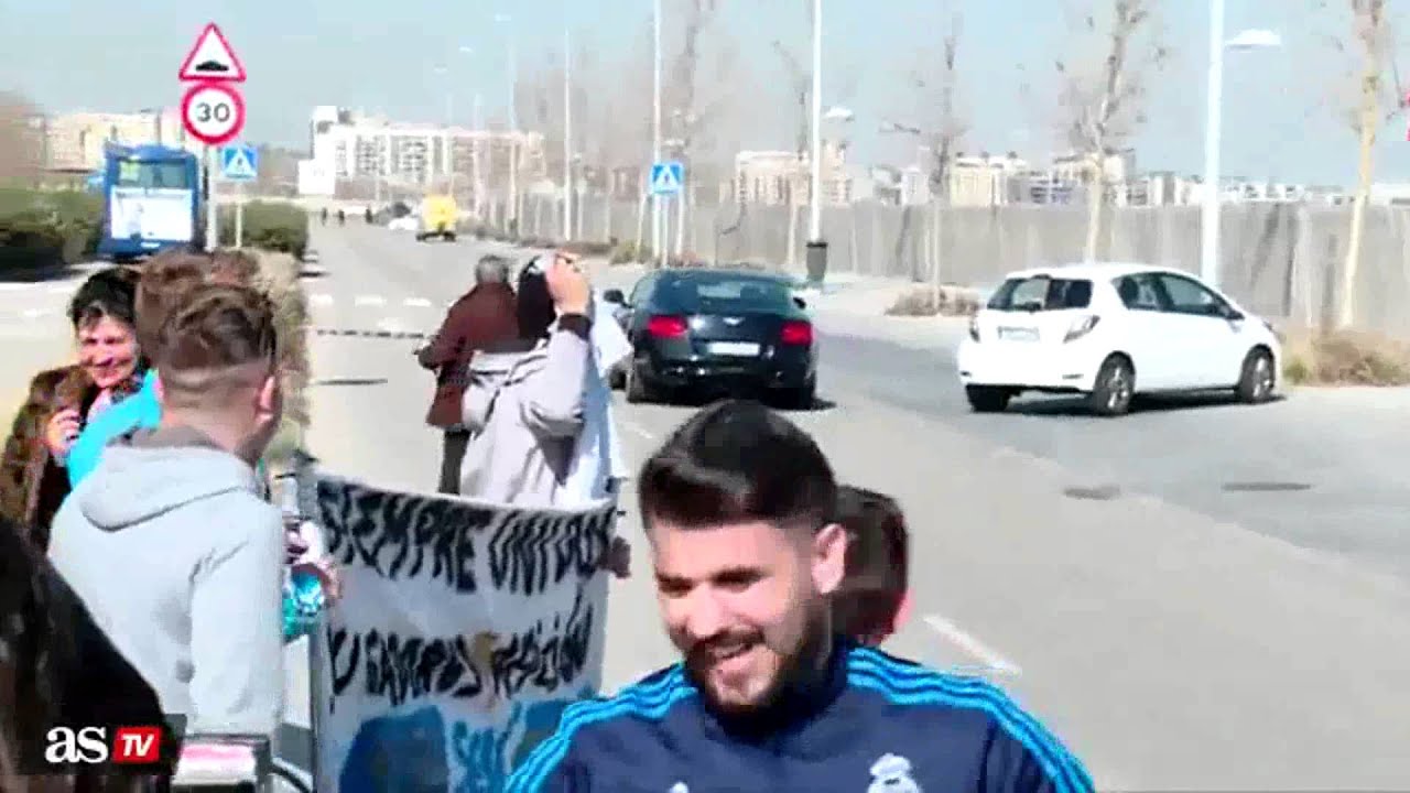 A fan plays it and the car for a photo with Luka Modric - YouTube