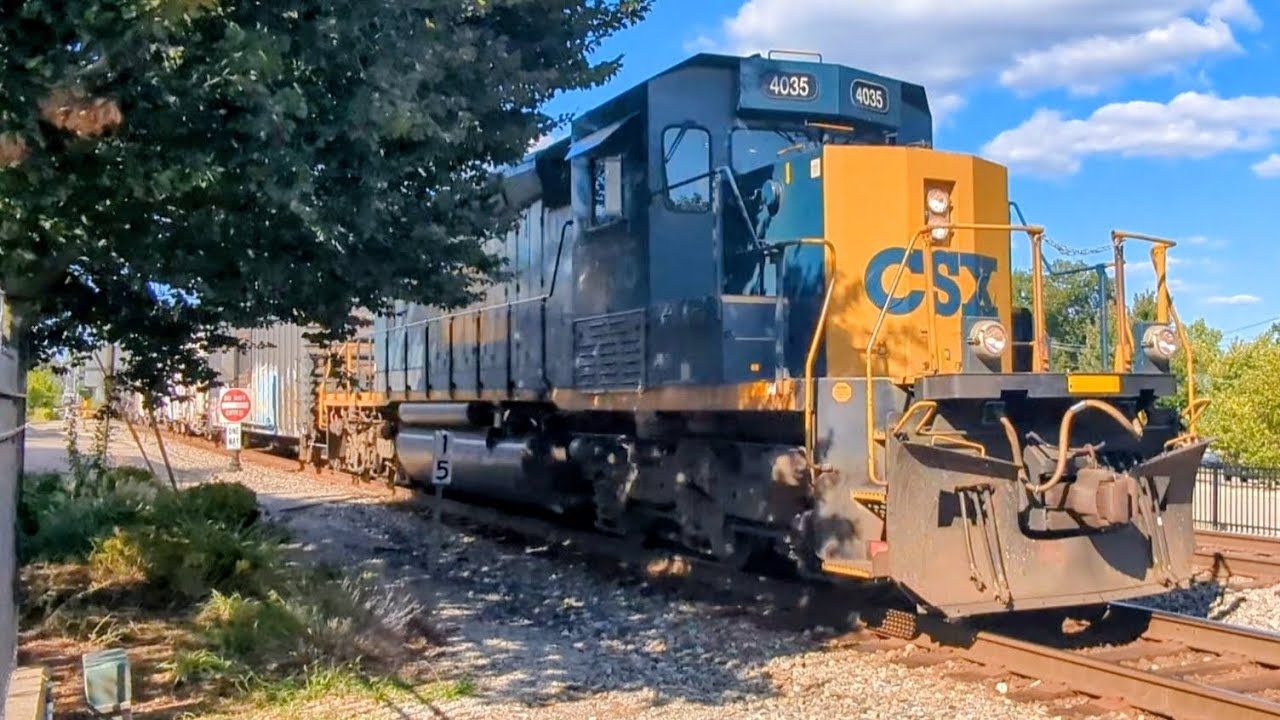 Southbound CSX local with manned platform on track one - YouTube