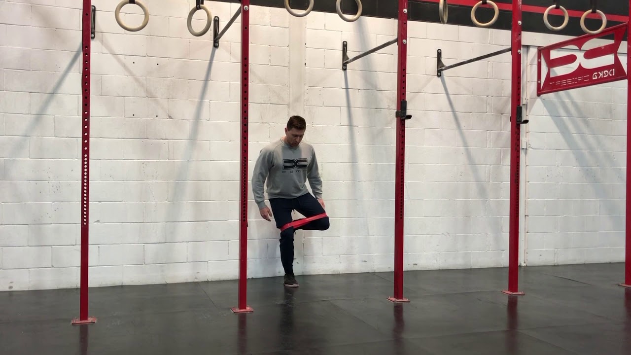 Clamshell With Foot On Wall - YouTube