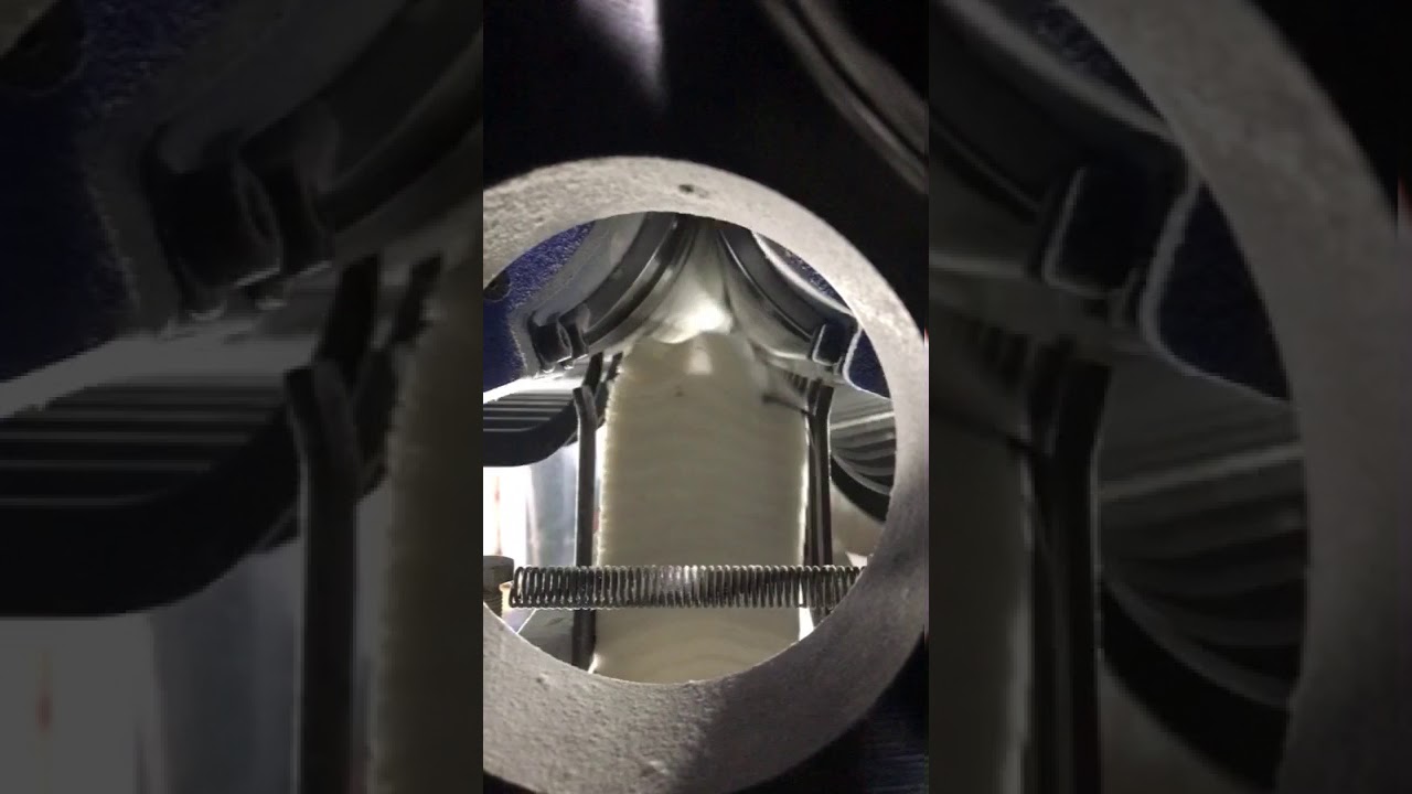 Facial tissue making machine interfolder - YouTube