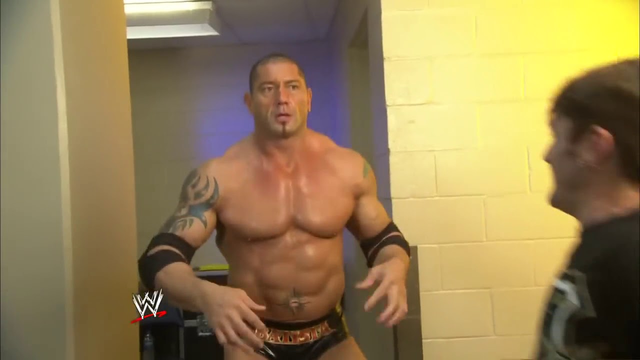 A WWE fan sneaks backstage to see Batista - YouTube