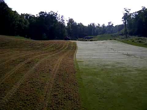 Verticutting #18 Fairway at the Ridge - YouTube