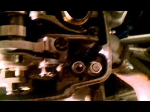 TRX450ER decompressor arm - YouTube