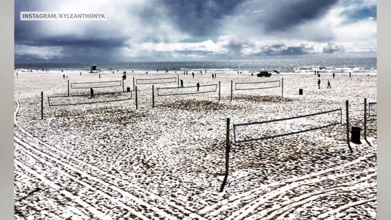 Californians encounter 'snow' at the beach - YouTube
