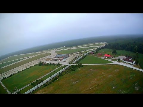 A foggy flight over abandoned military air strip.tsrc a6 drone - YouTube