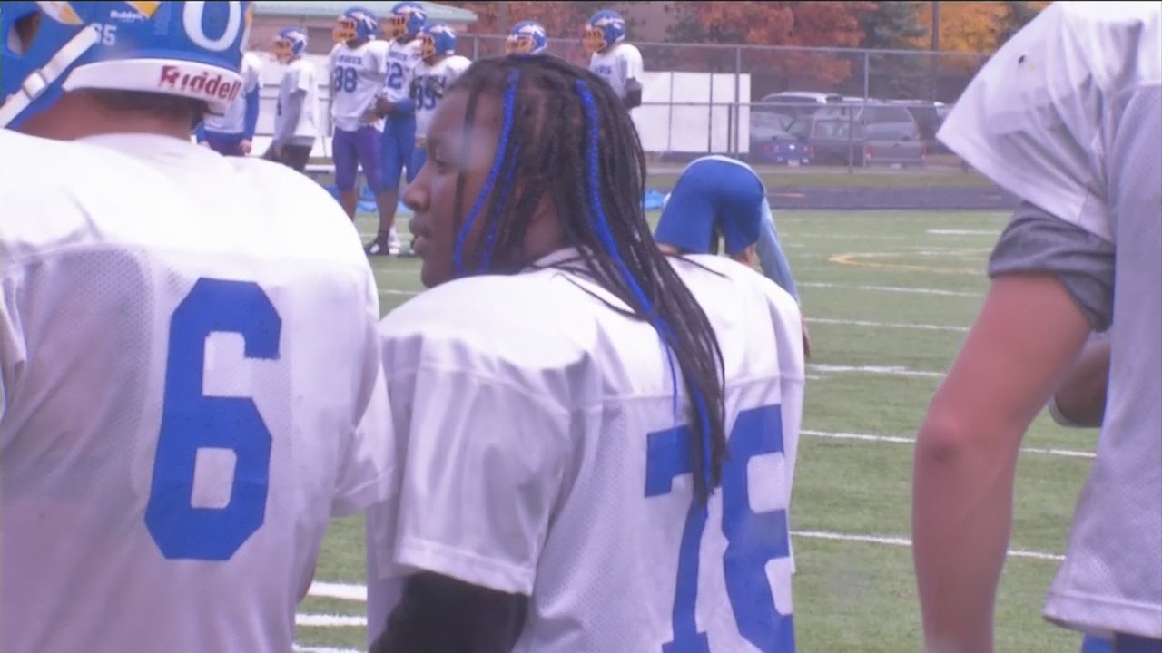 First female football player to earn Varsity Letter - YouTube