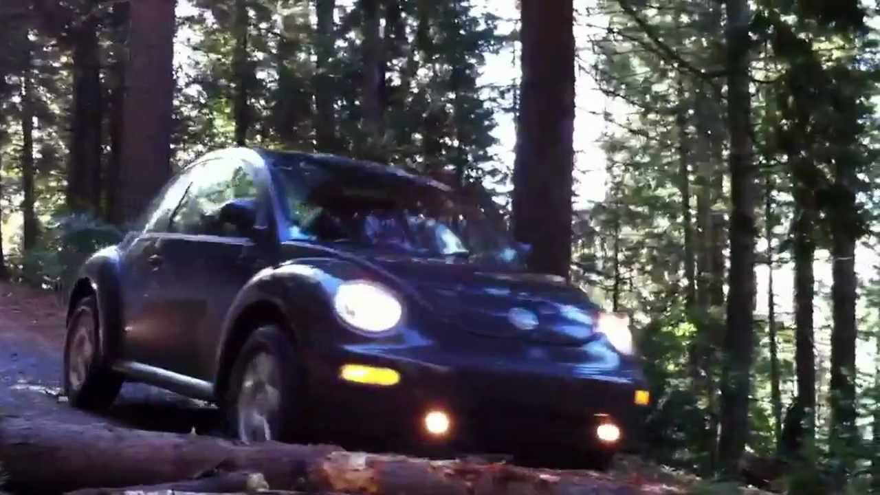 Lifted 98 VW New Beetle TDI driving over fallen tree - YouTube