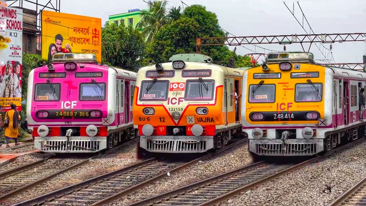 Different colour but similar model Indian EMU local trains crossing ...