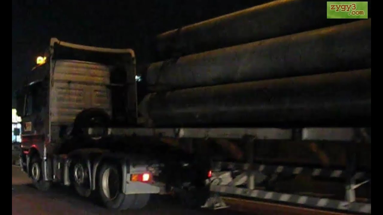 Heavy Overload Transport Trucks Transporting Steel Piles - YouTube