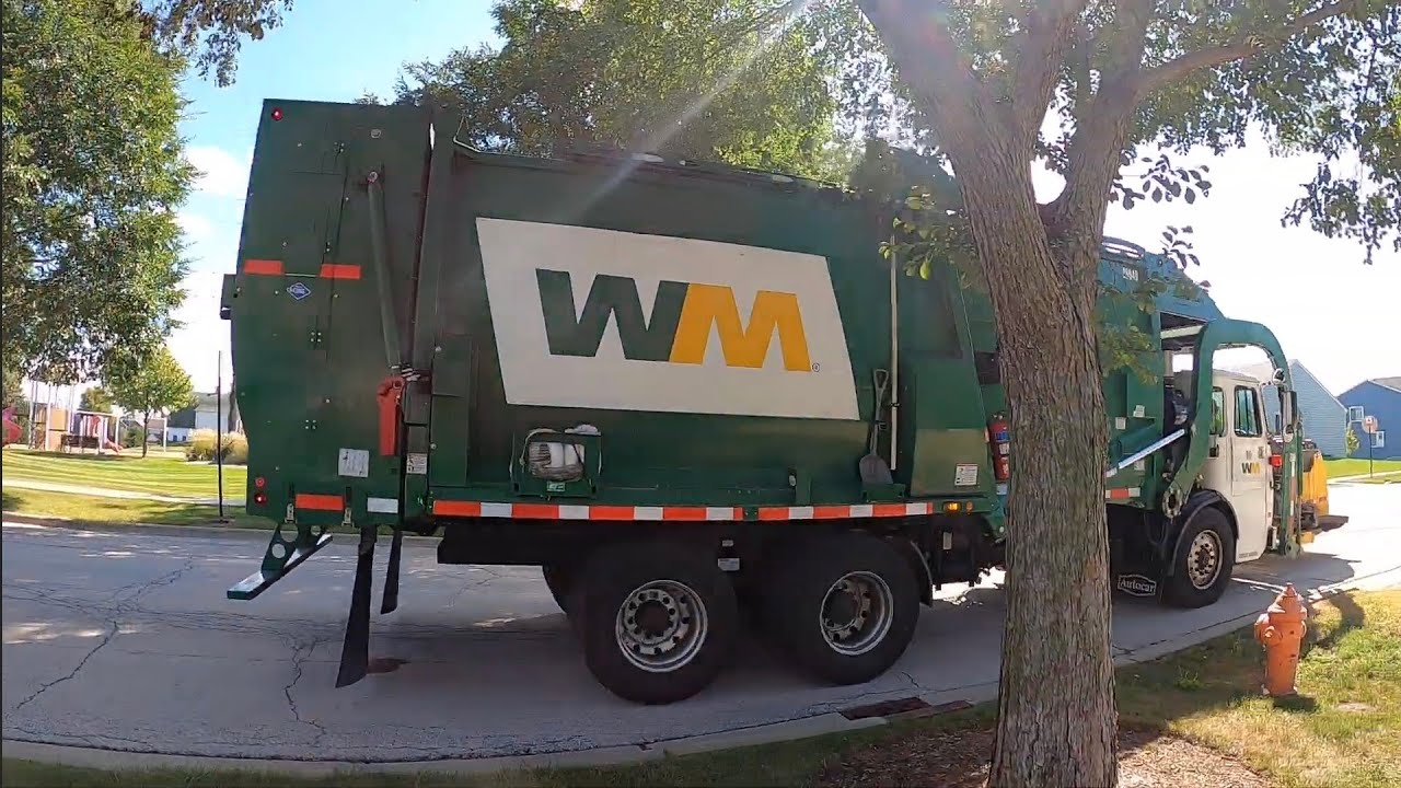 WM Garbage truck on trash - YouTube