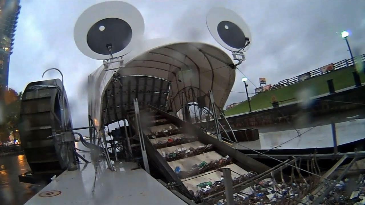 River trash traps chew at ocean plastics problem - YouTube