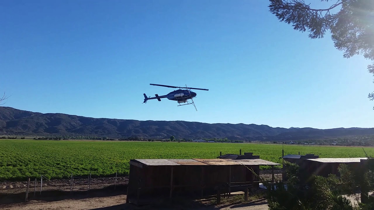 Helicopter Crop Dusting - YouTube