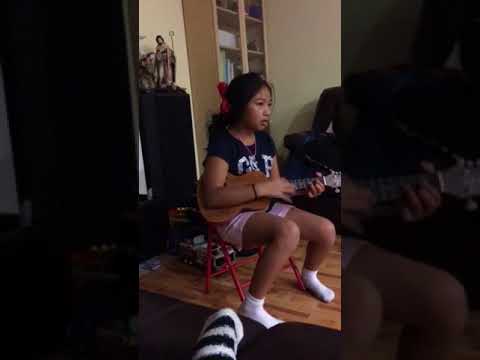 Liana playing ukelele 2017