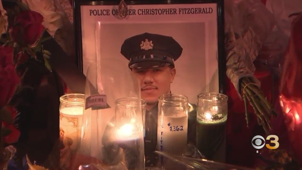 Community starts to gather for Officer Fitzgerald's viewing - YouTube
