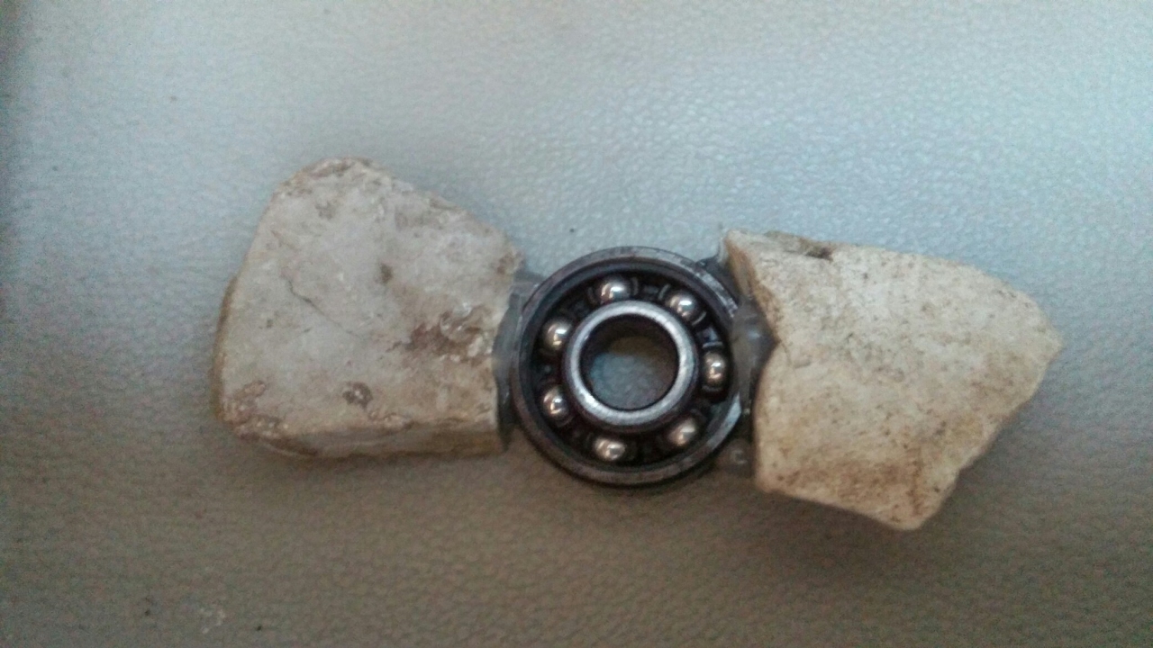 Homemade fidget spinner made of rocks!! It works!! - YouTube