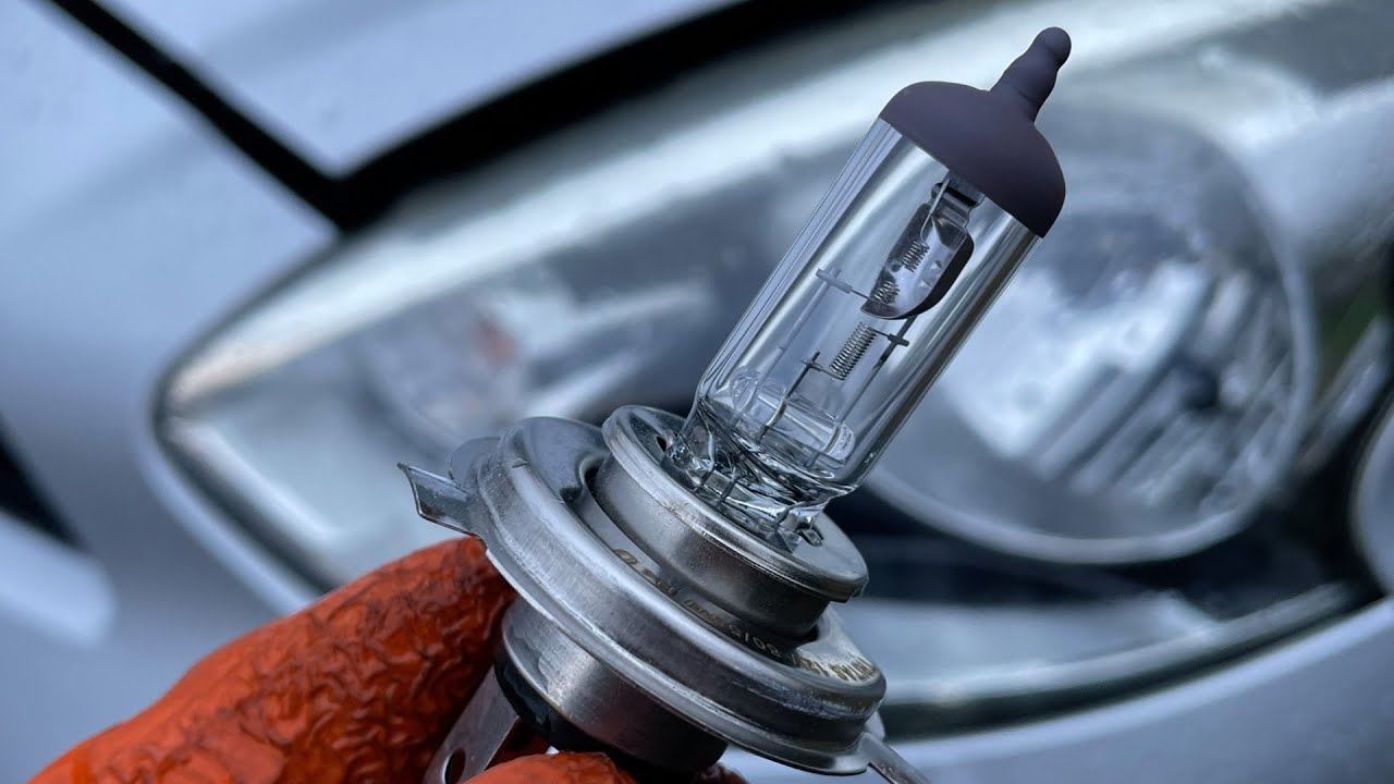 How to replace headlight bulb on Nissan Micra, dipped headlights - YouTube