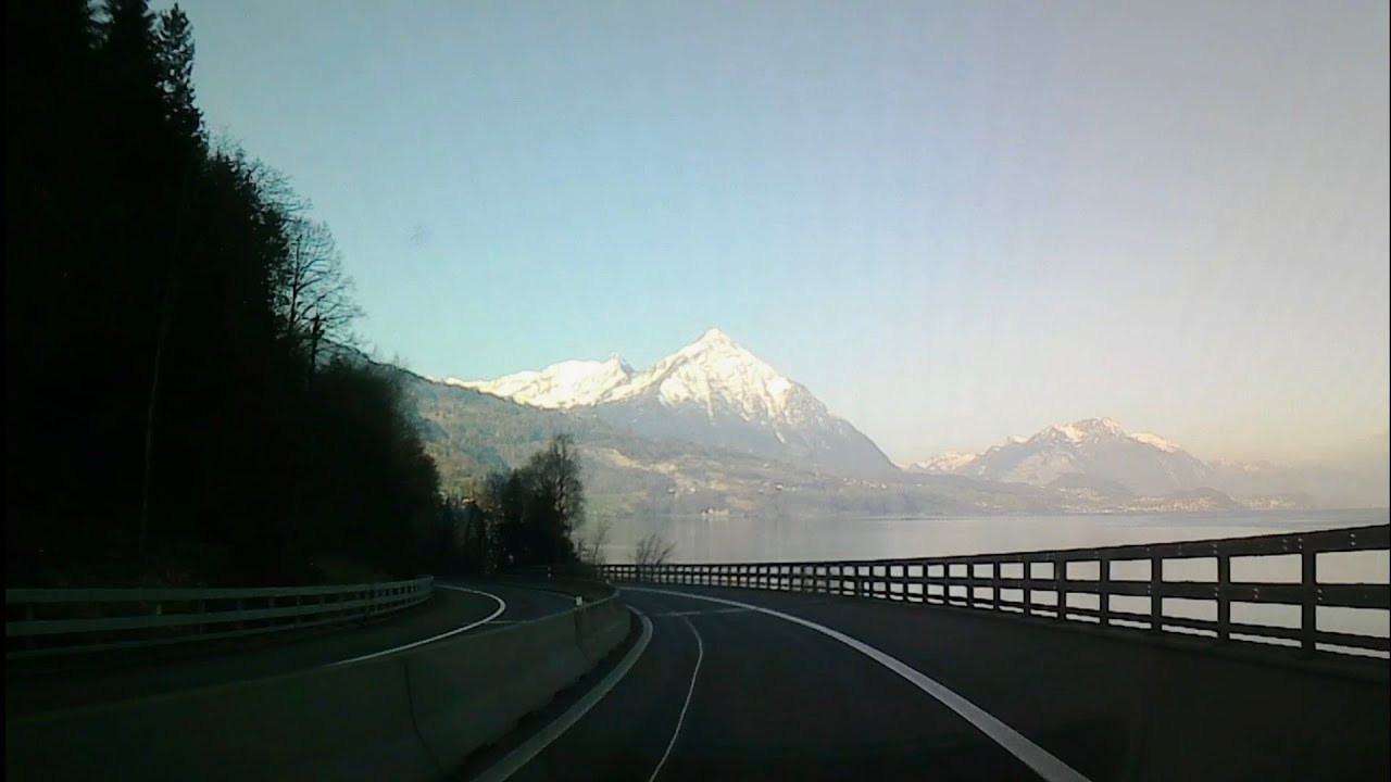 Driving through Switzerland - Lauterbrunnen, Interlaken, Thunersee and ...