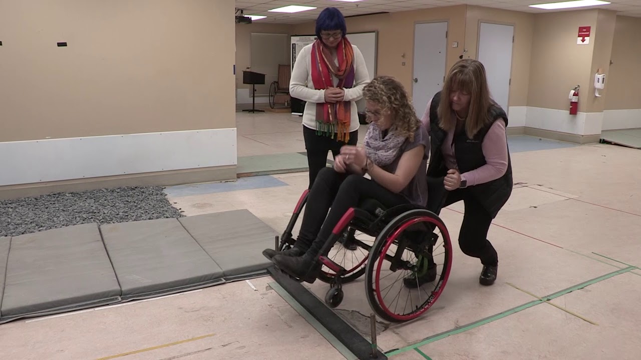 Manual Wheelchair Skill: Gets over obstacle, training with caregiver ...