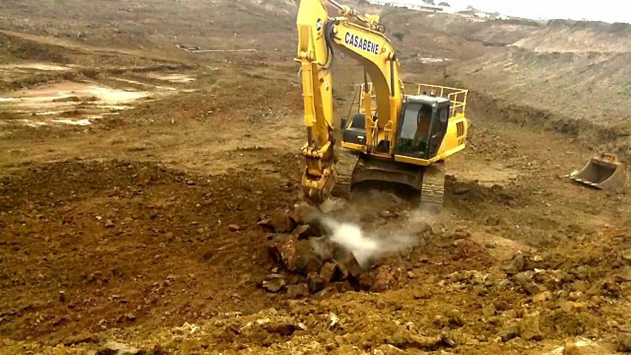 35 ton excavator ripping rock - YouTube
