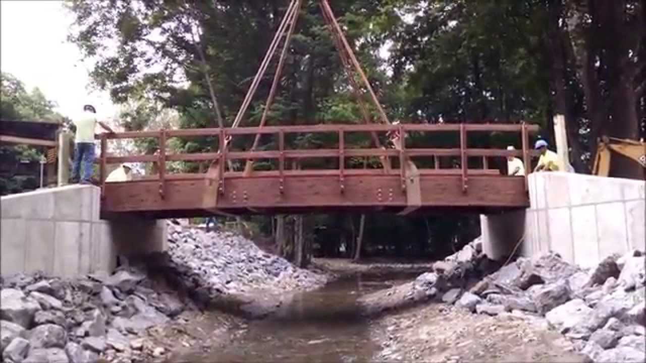 Installing A Glulam Pedestrian Bridge - YouTube